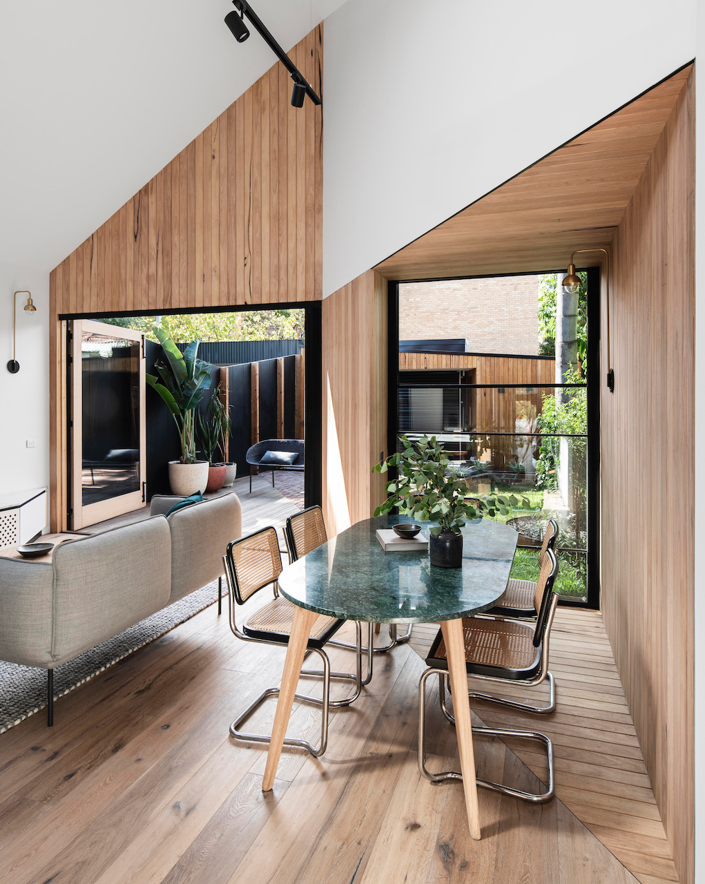 Pitched Roof Gives a Playful and Updated Appearance - Mid Century Home