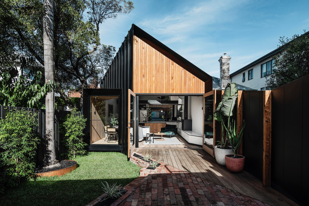 Pitched Roof Gives a Playful and Updated Appearance - Mid Century Home