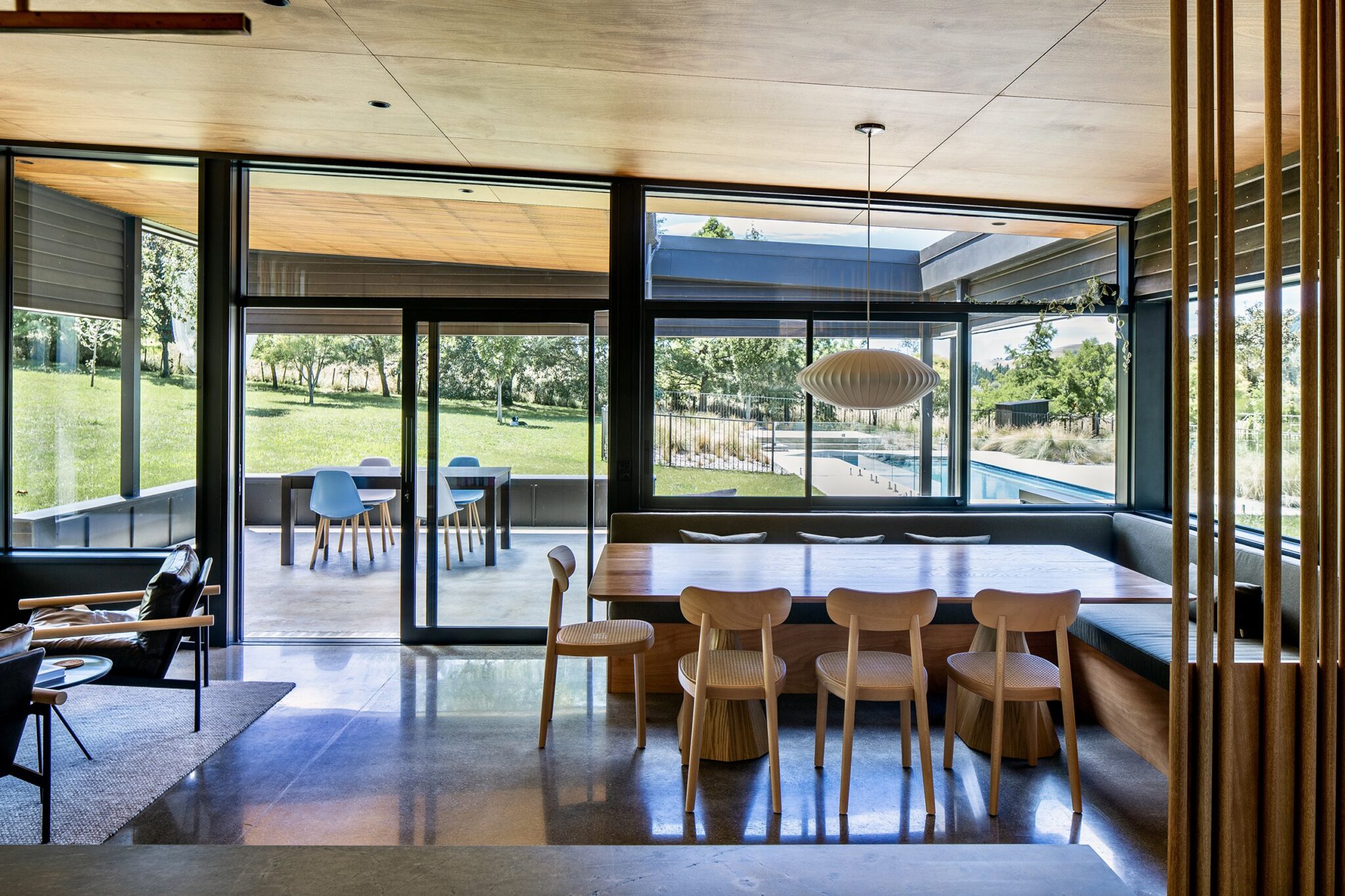 A Modern Home Seamlessly Integrated with Nature's Beauty - Mid Century Home